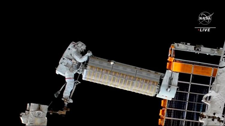 Spacewalking Astronauts Install Solar Array Outside International Space