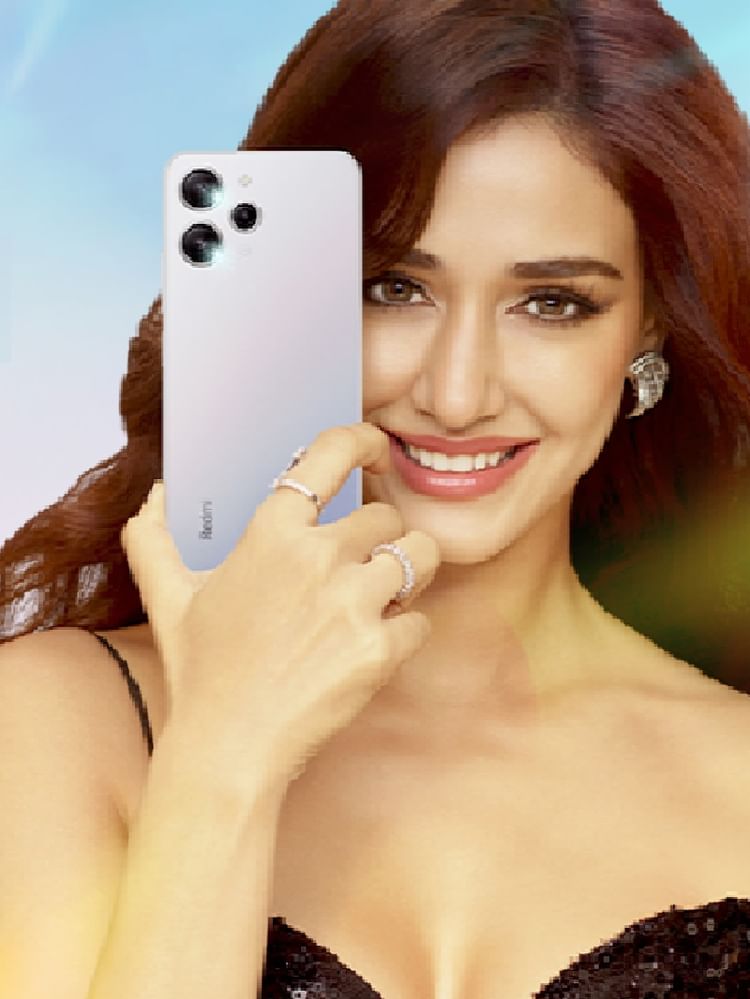 तस्वीरों में देखें कैसा है Redmi 12 4g