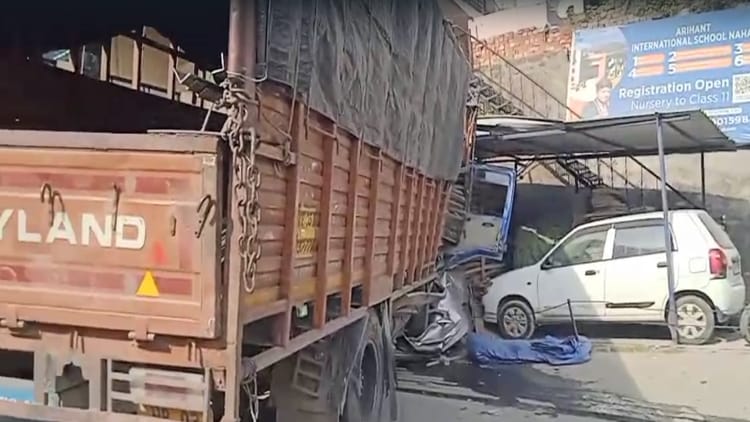 A Truck Loaded With Iron Rods Hit The Wall Of A House, Crushing A Car ...