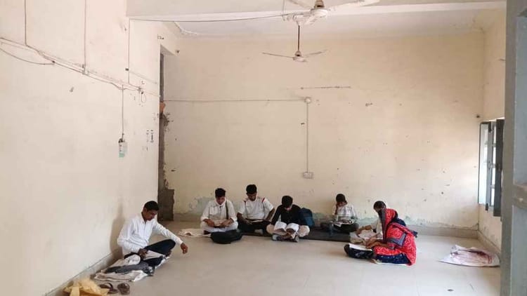 Youths Are Standing At The Old Place Of The District Library, Sitting ...