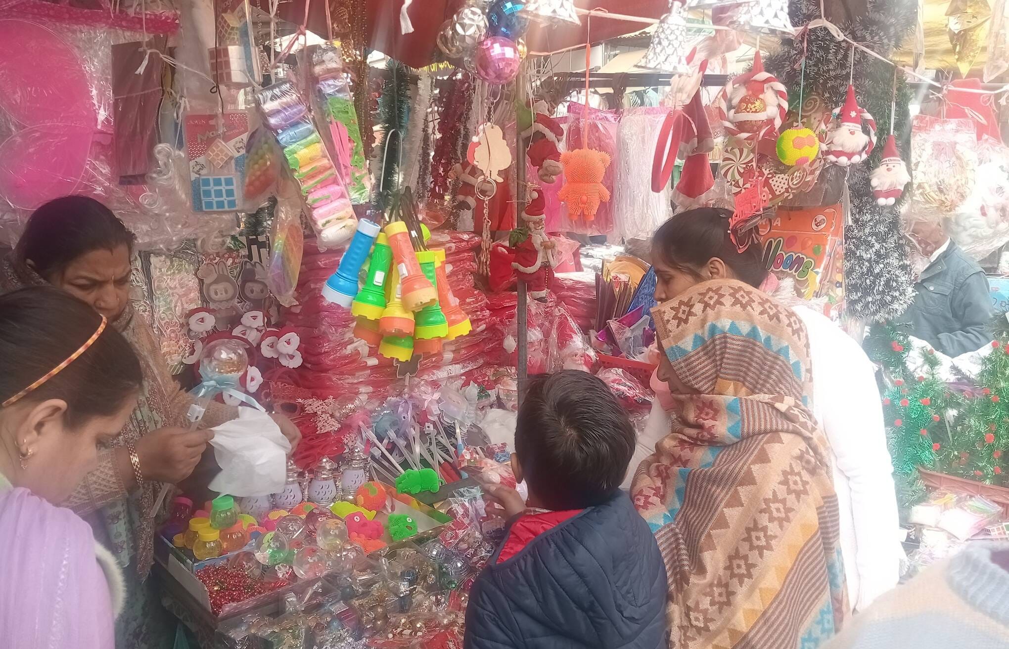 Shops Decorated With Christmas Trees, Jingle Bells, Santa Dresses ...