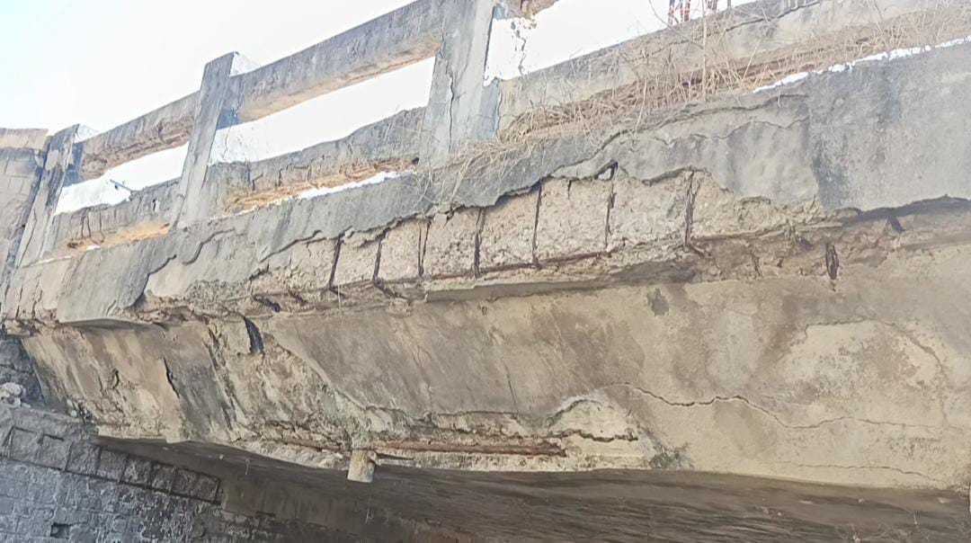 A Bridge Hanging On Rusty Iron Rods Is Inviting Disaster, But The ...