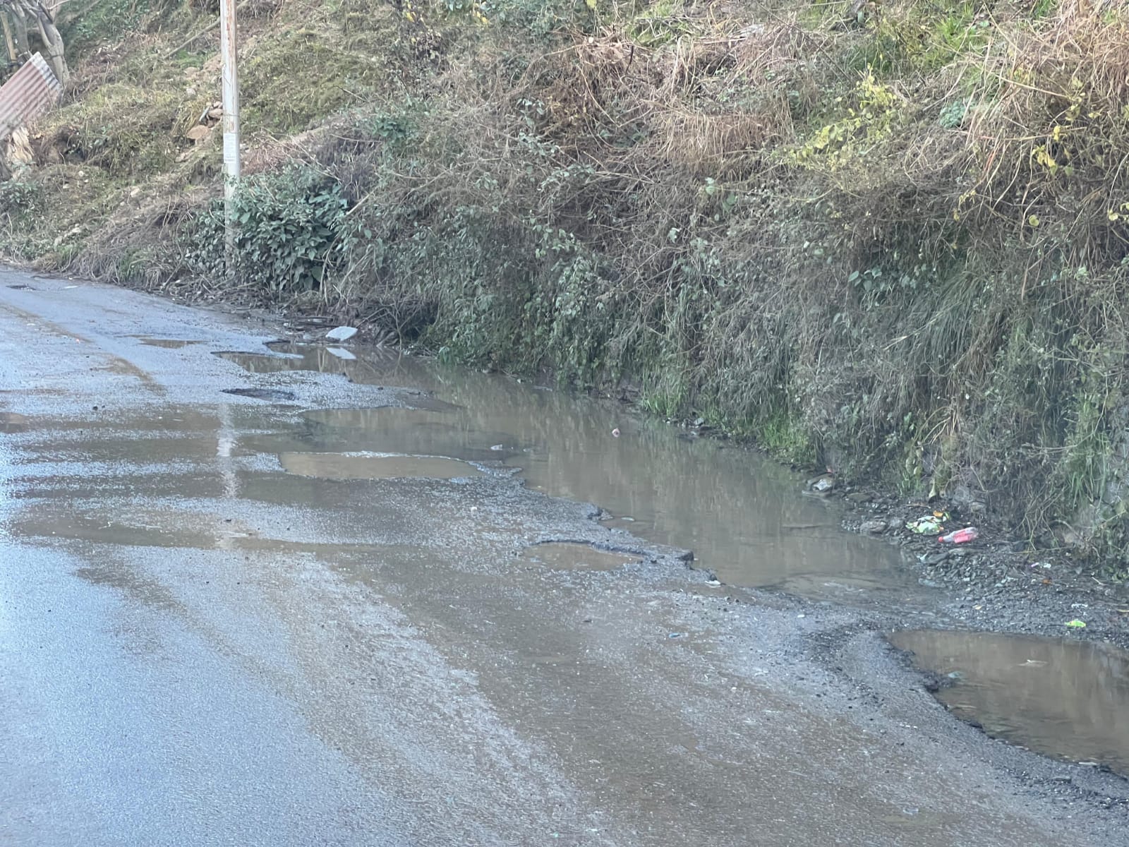 Water From A Private Building On The Kotkhai Bazaar Road Has Become A ...