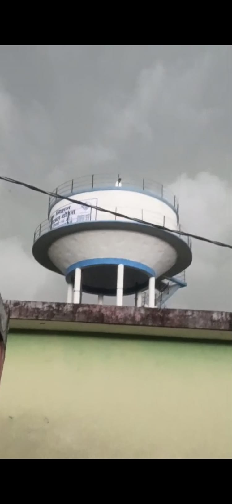 Distraught Over A Broken Relationship, A Young Man Climbed Atop A Water ...