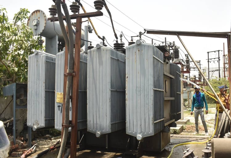 Burning Transformers Are Being Cooled By Installing Coolers And Pouring ...