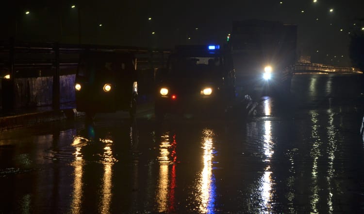The Storm And Rain Caused Billboards, Trees And Poles To Fall, And ...