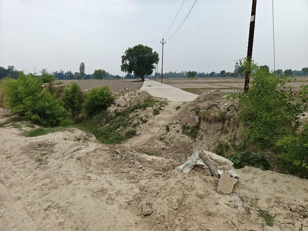 Bridge Broken During Silt Cleaning, Villagers Pass Through Miner's Pit ...