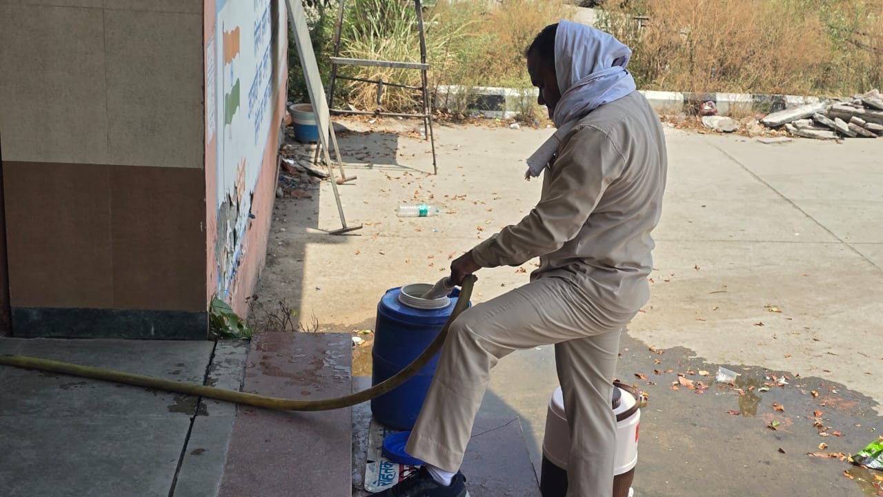 Water Containers Are Being Placed In Buses For Passengers Amidst The ...