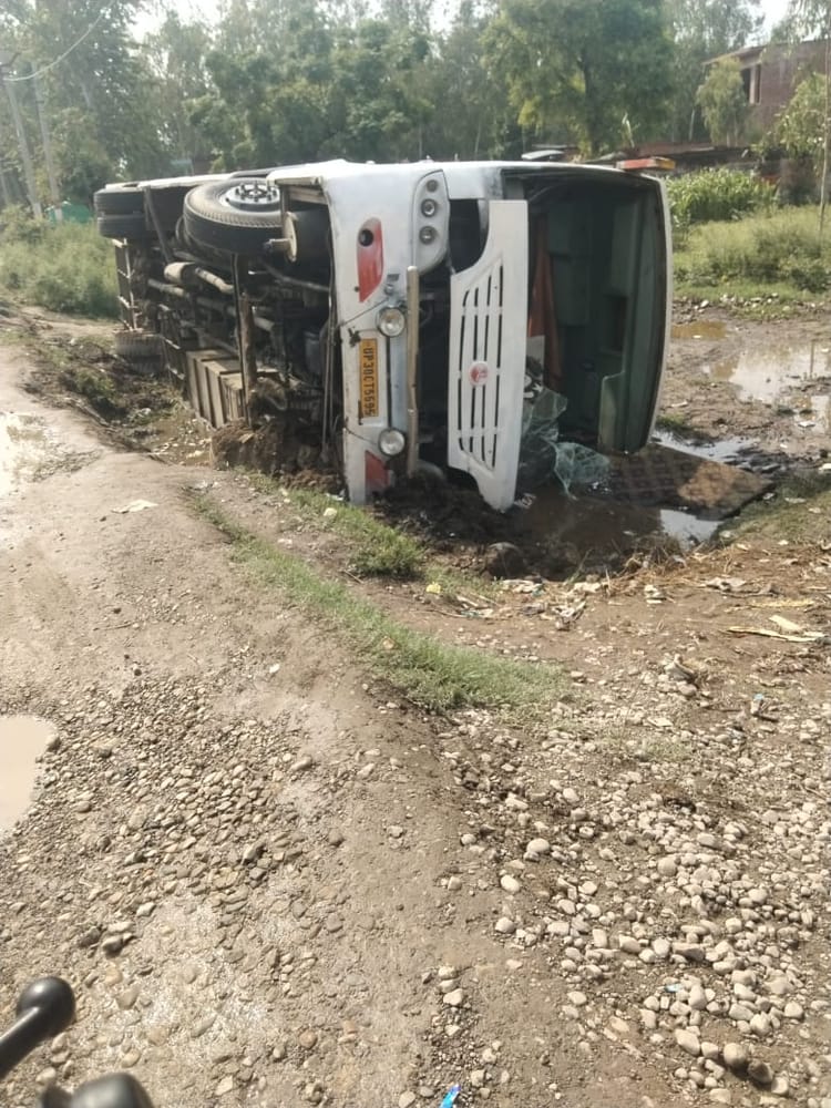 A Bus Bound For Manauna Dham Went Out Of Control And Overturned Into A ...