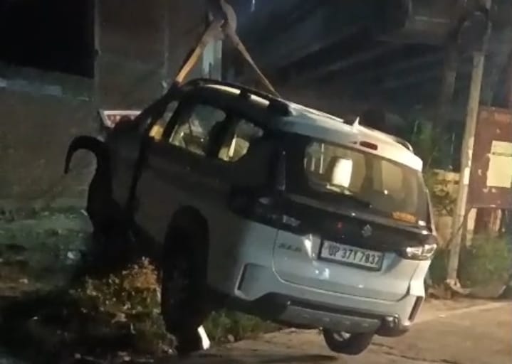 An Out-of-control Car Hit A Divider And Overturned, Striking Another ...