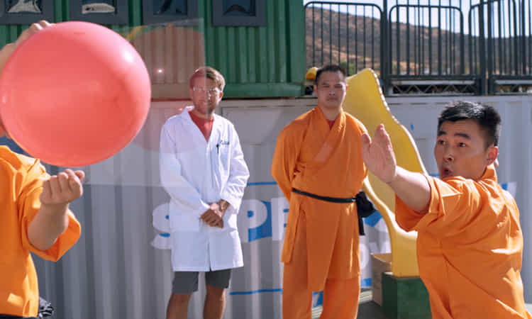 Shaolin Monk Blow Up Balloon With A Needle Through The Glass Video ...